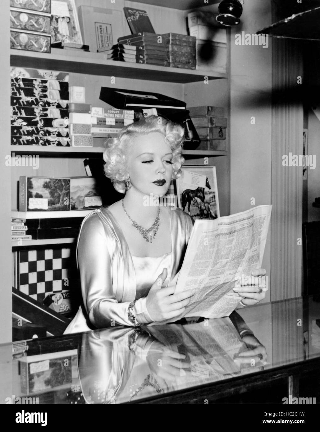 NEW ORLEANS, Marion Martin, catching up on the news between scenes ...