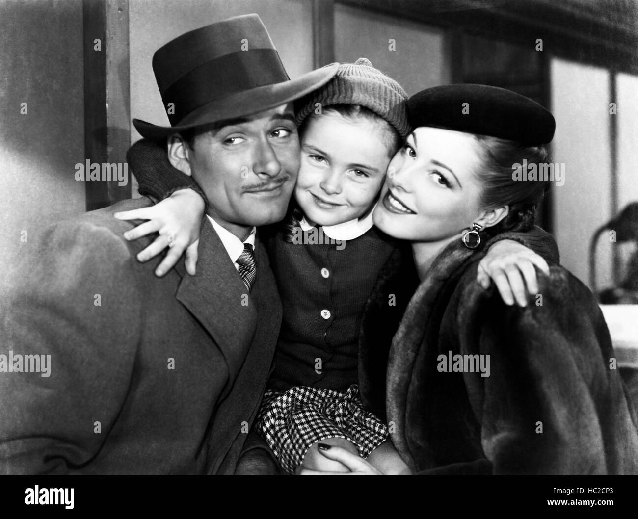NEVER SAY GOODBYE, from left: Errol Flynn, Patti Brady, Eleanor Parker ...