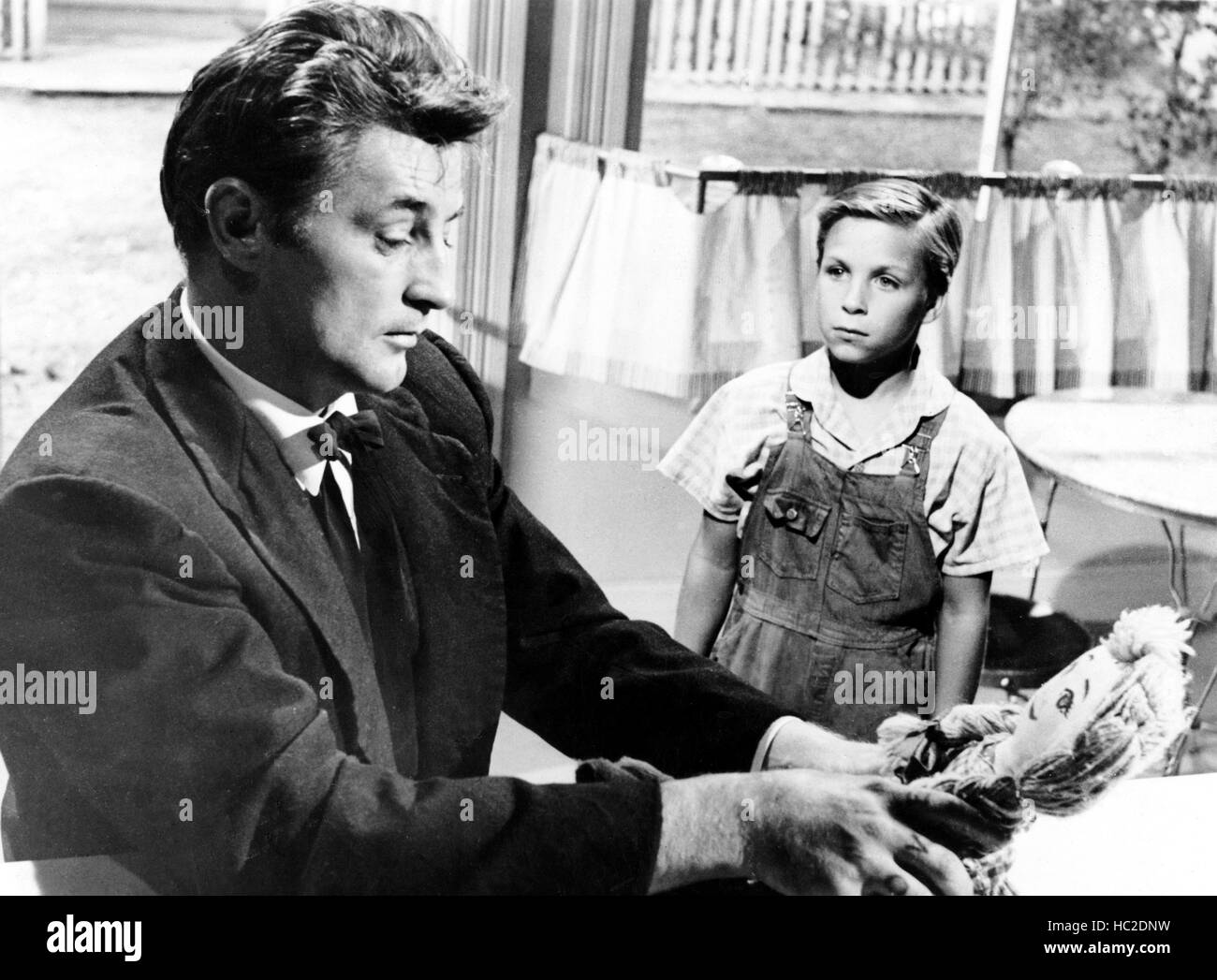 THE NIGHT OF THE HUNTER, Robert Mitchum, Billy Chapin, 1955 Stock Photo ...