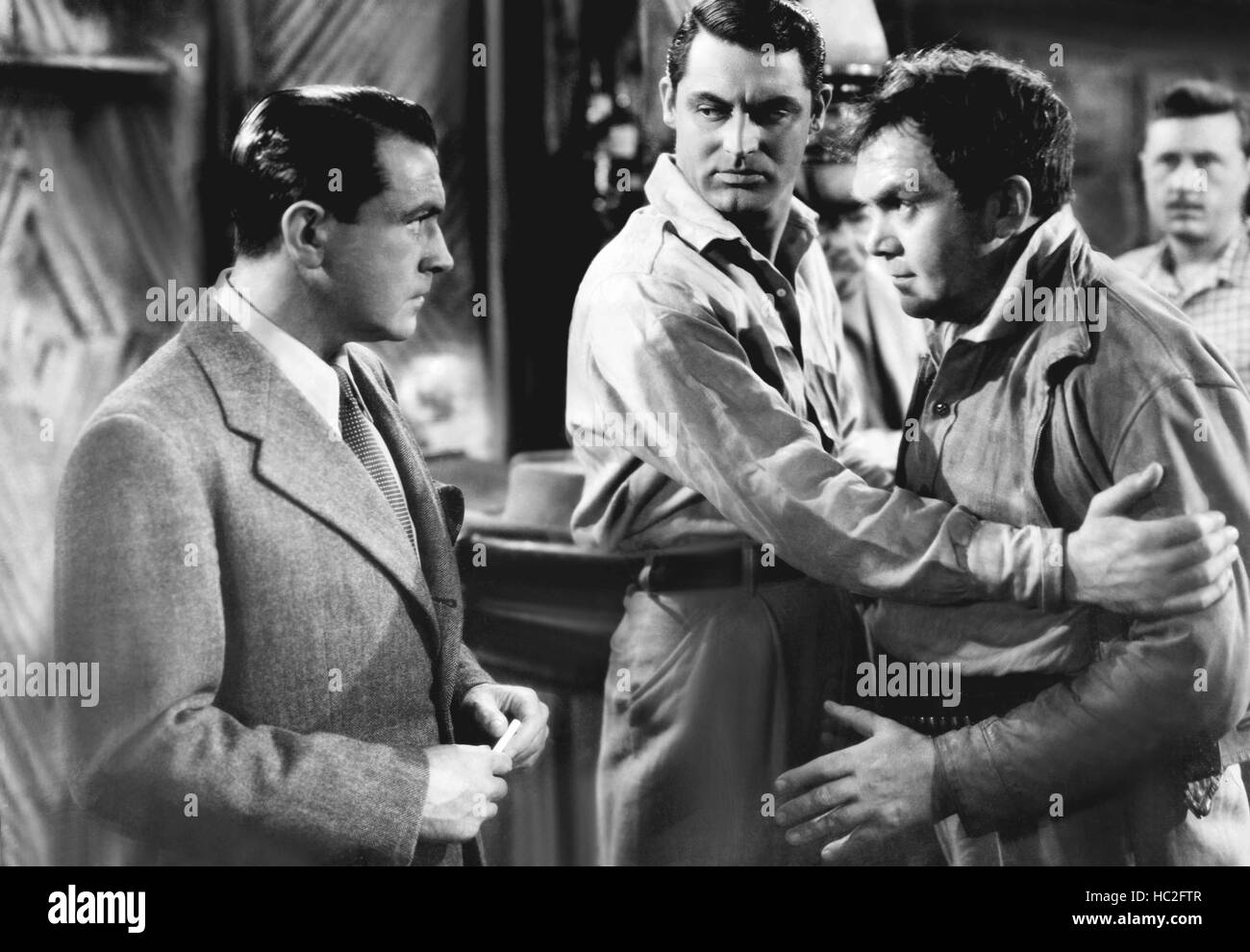 ONLY ANGELS HAVE WINGS, from left, Richard Barthelmess, Cary Grant ...