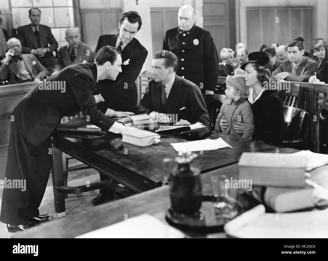 ON TRIAL, from left: Larry Williams, Edward Norris (standing), John ...