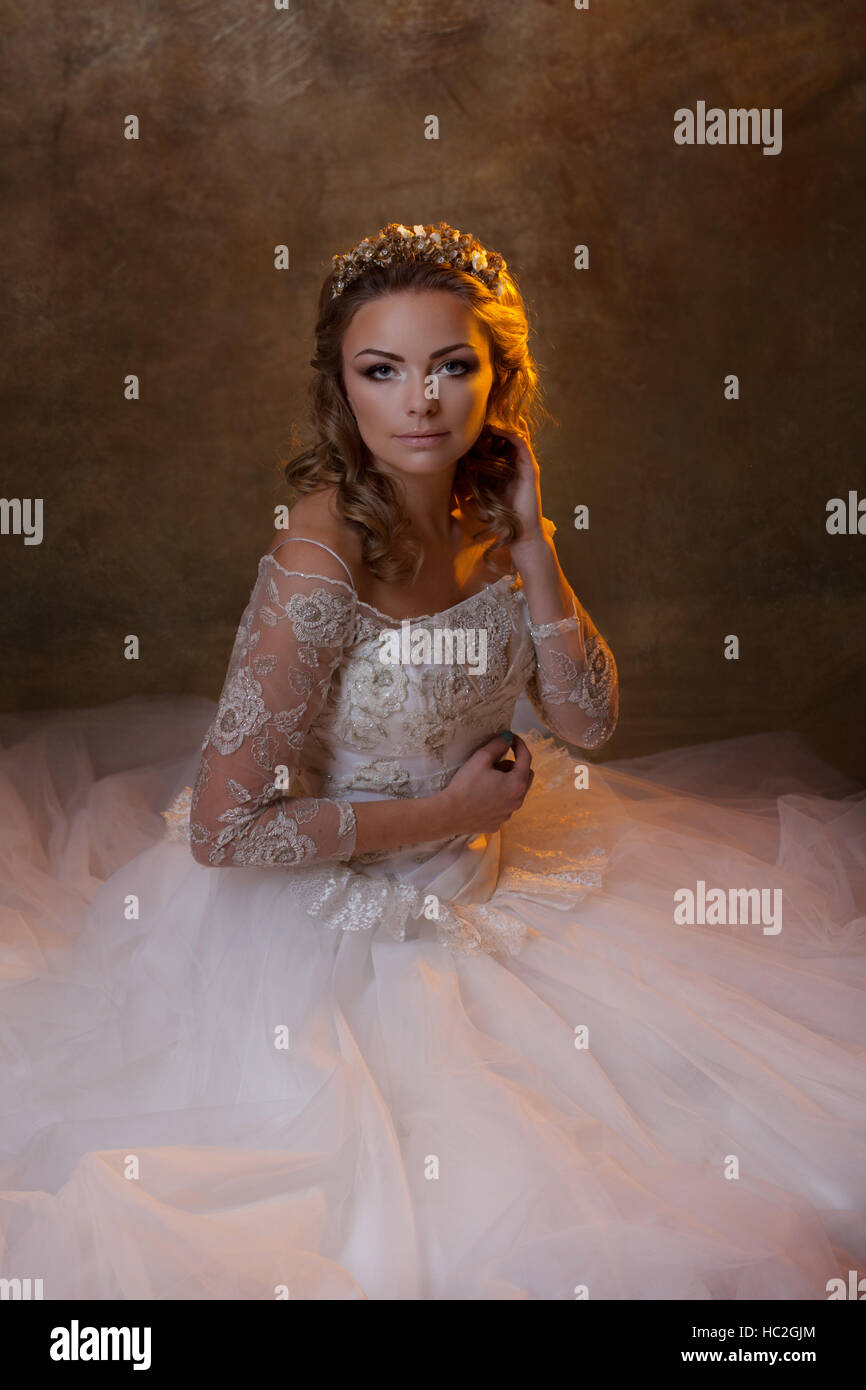 Beautiful girl bride in luxurious wedding dress, portrait in Golden ...