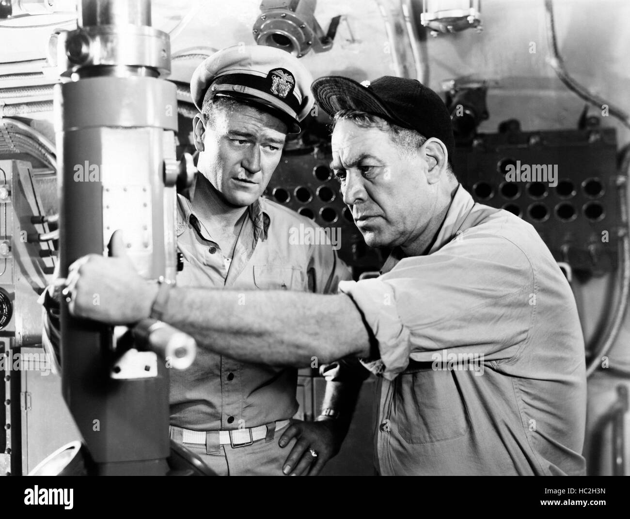 OPERATION PACIFIC, from left: John Wayne, Ward Bond, 1951 Stock Photo ...