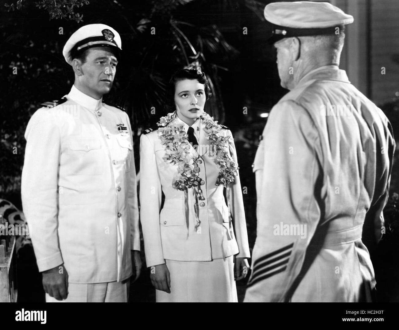 OPERATION PACIFIC, from left: John Wayne, Patricia Neal, Jack Pennick ...