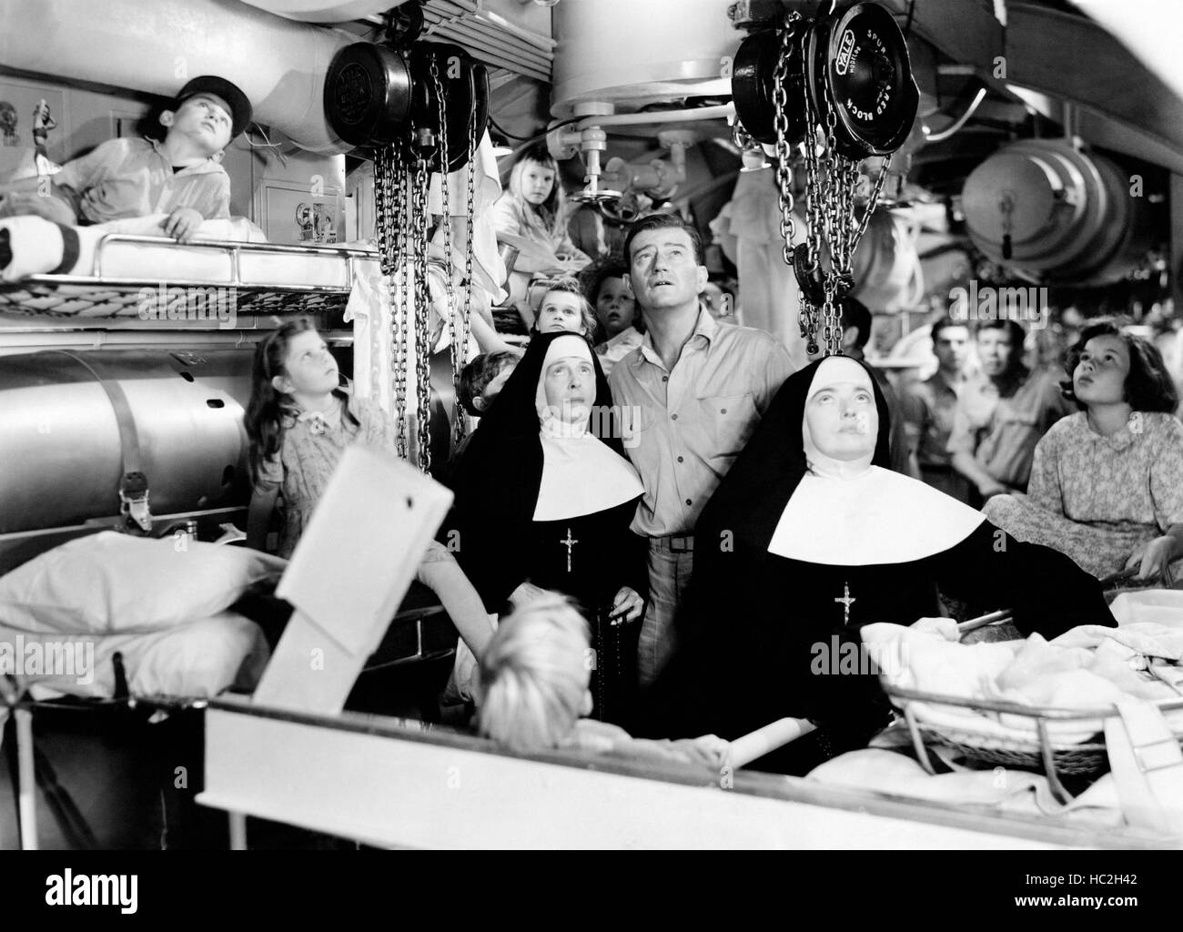 OPERATION PACIFIC, Virginia Brissac (nun left), John Wayne, 1951 Stock ...
