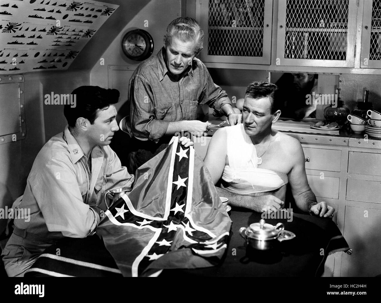 OPERATION PACIFIC, from left, Scott Forbes, Jack Pennick, John Wayne ...