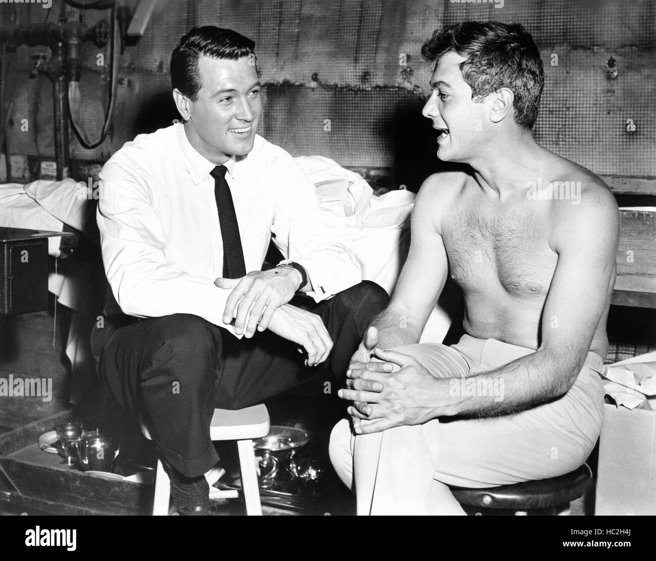 OPERATION PETTICOAT, from left: Rock Hudson visiting Tony Curtis on set, 1959 Stock Photo - Alamy