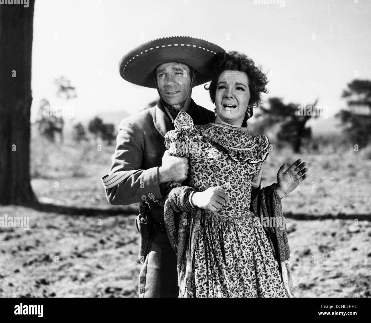 MASSACRE, from left, Dane Clark, Martha Roth, 1956, TM & Copyright ©20th Century Fox Film Corp ...