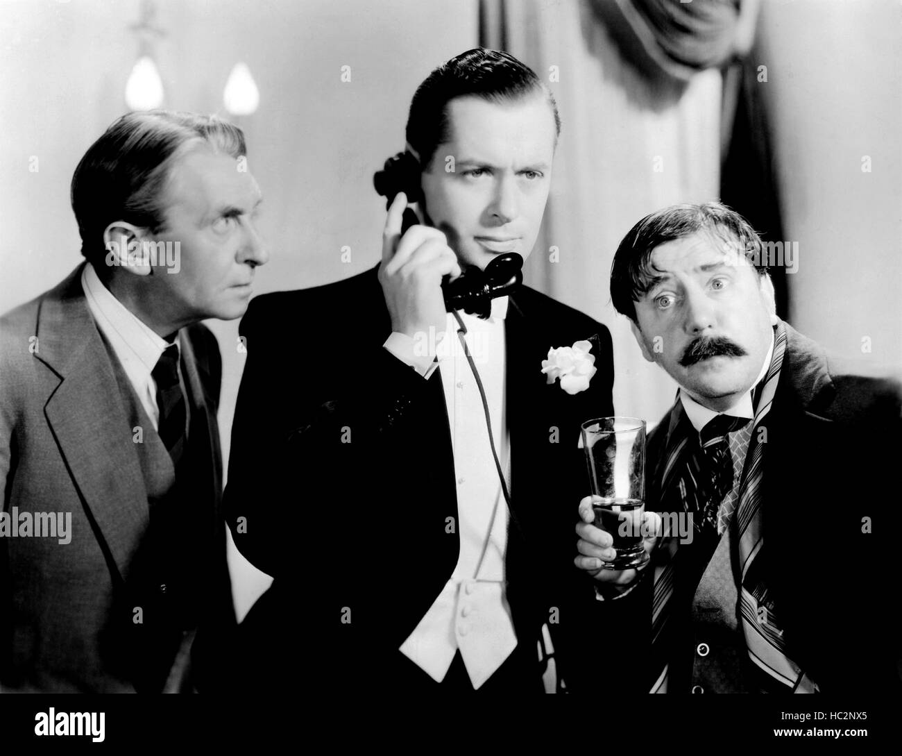 THE MYSTERY OF MR. X, Robert Montgomery, (center), Forrester Harvey ...