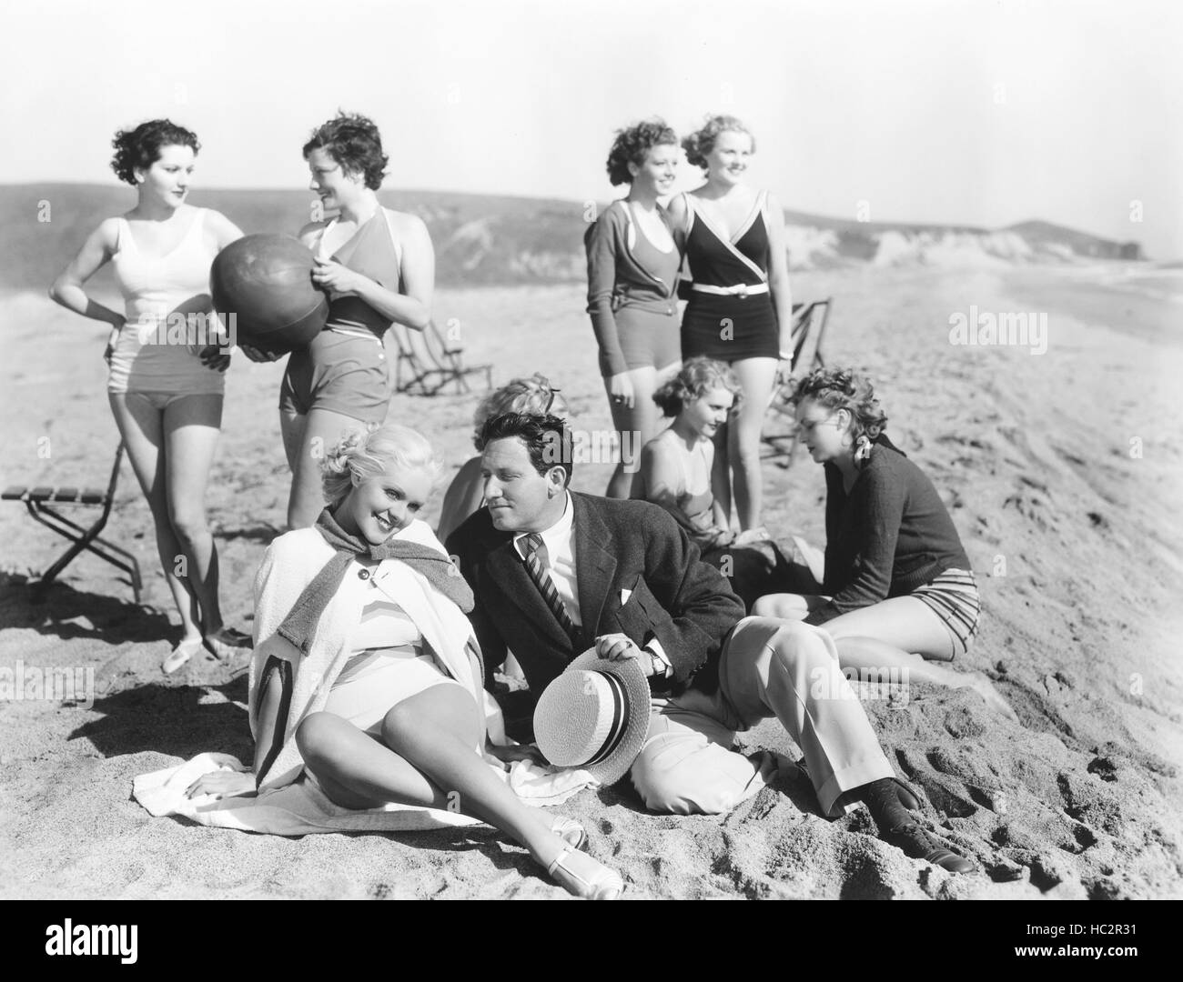 NOW I'LL TELL, front from left: Alice Faye, Spencer Tracy, rear from ...