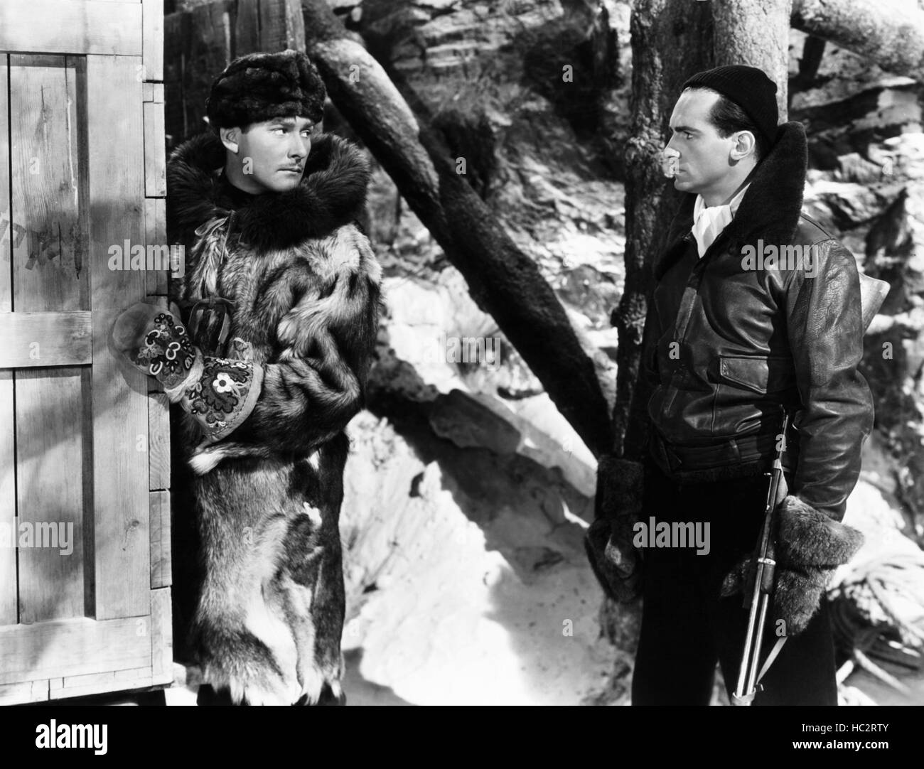 NORTHERN PURSUIT, from left: Errol Flynn, Helmut Dantine, 1943 Stock ...