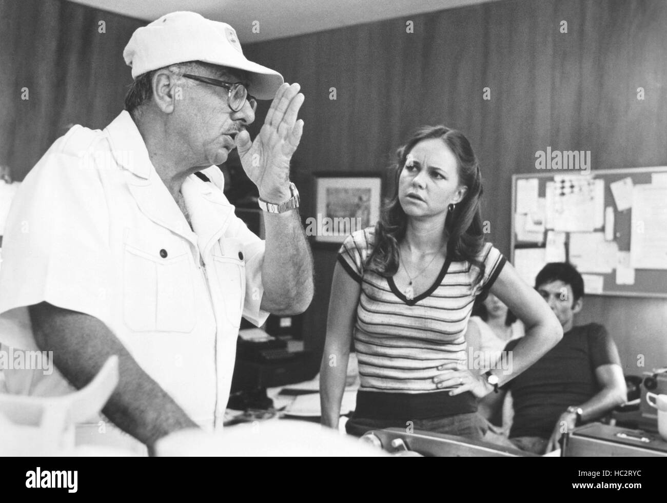 NORMA RAE, from left, director Martin Ritt, Sally Field, on-set, 1979 ...