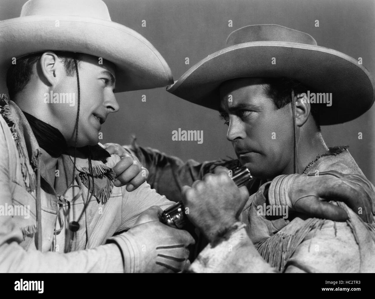 OUTLAW EXPRESS, from left: Bob Baker, LeRoy Mason, 1938 Stock Photo - Alamy