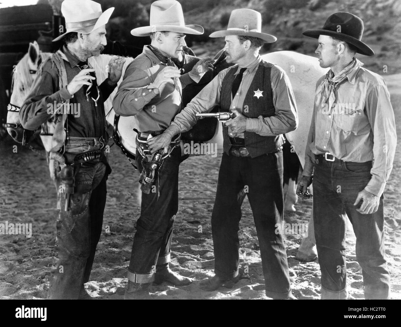 OUTLAWED GUNS, from left: Frank McGlynn Sr, Buck Jones, Joseph W Girard ...