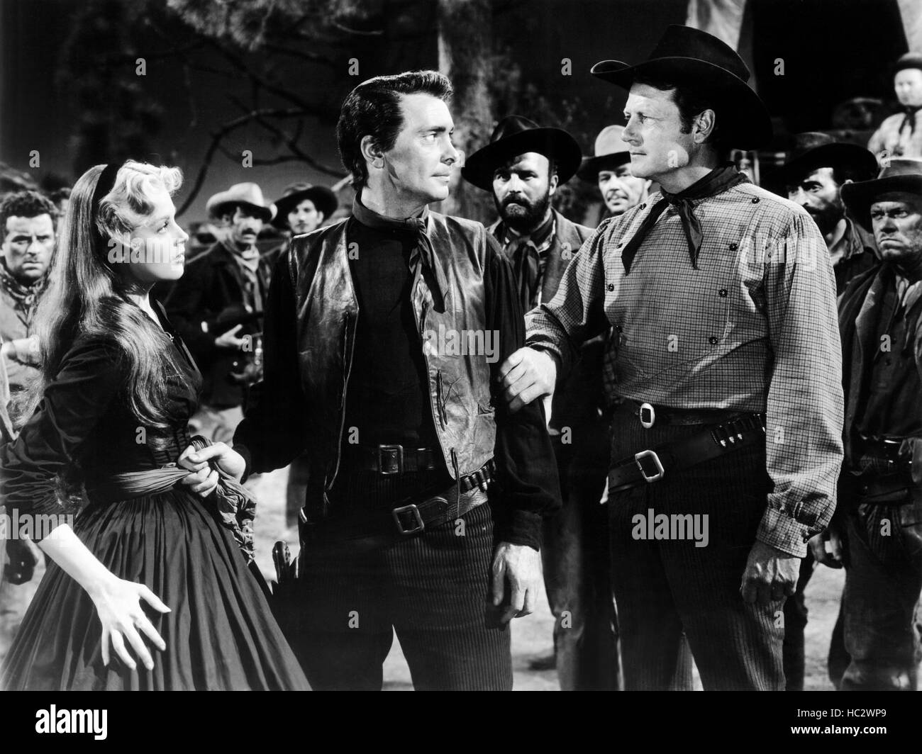 THE OUTRIDERS, from left: Arlene Dahl, Barry Sullivan, Joel McCrea ...