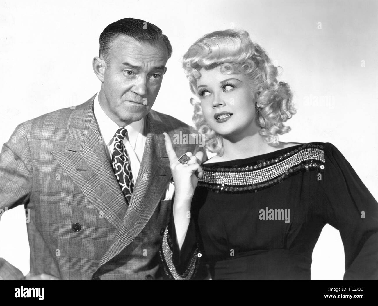 PENTHOUSE RHYTHM, from left, Donald MacBride, Marion Martin, 1945 Stock Photo - Alamy