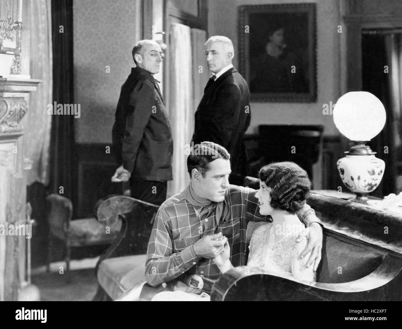 THE PHANTOM CITY, front from left: Ken Maynard, Eugenia Gilbert, 1928 ...