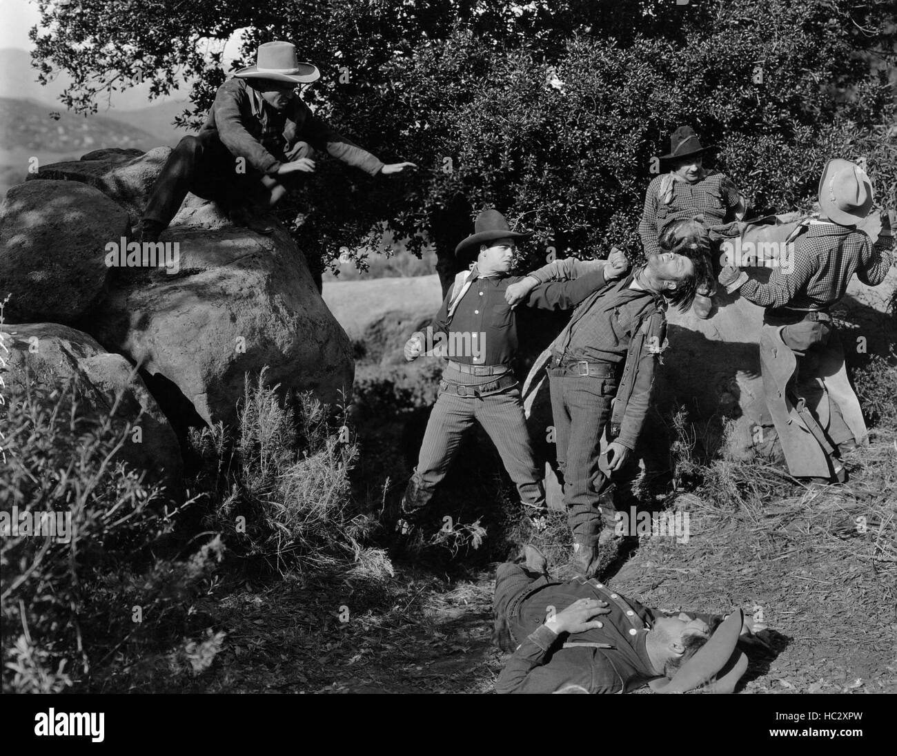 THE PHANTOM COWBOY, second from left: Ted Wells, 1935 Stock Photo - Alamy