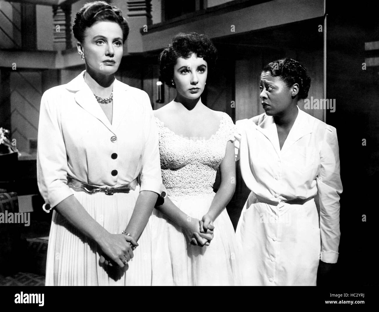 A PLACE IN THE SUN, from left, Frieda Inescort, Elizabeth Taylor, Frances Driver, 1951 Stock ...