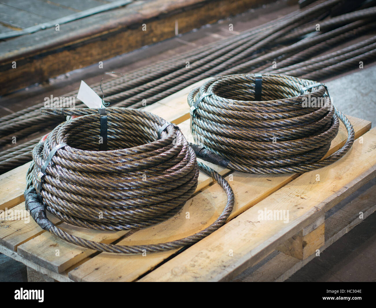storage of steel coils of rope Stock Photo - Alamy