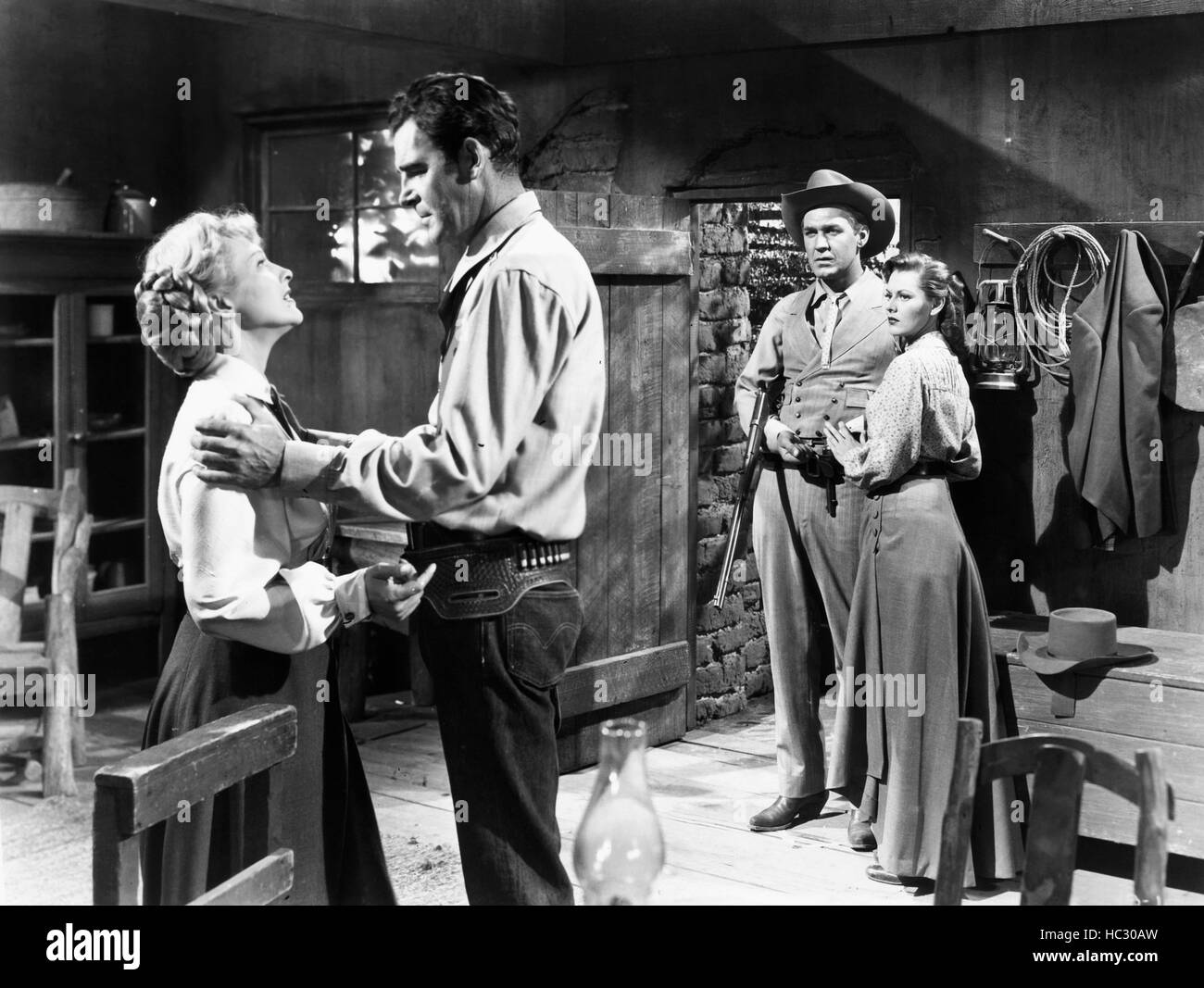 THE PLUNDERERS, from left: Ilona Massey, Rod Cameron, Forrest Tucker ...