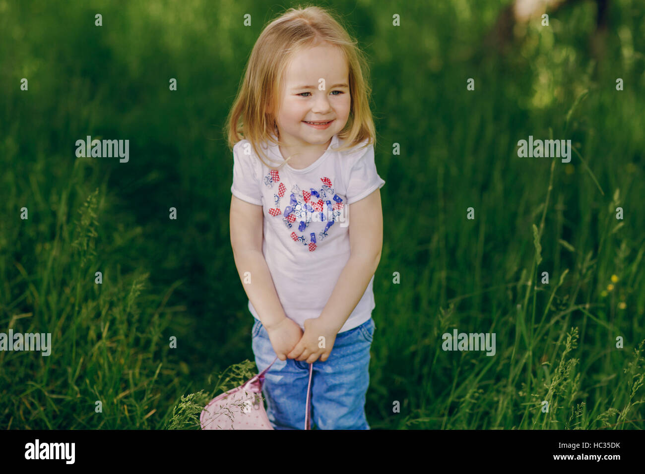 child near tree Stock Photo - Alamy
