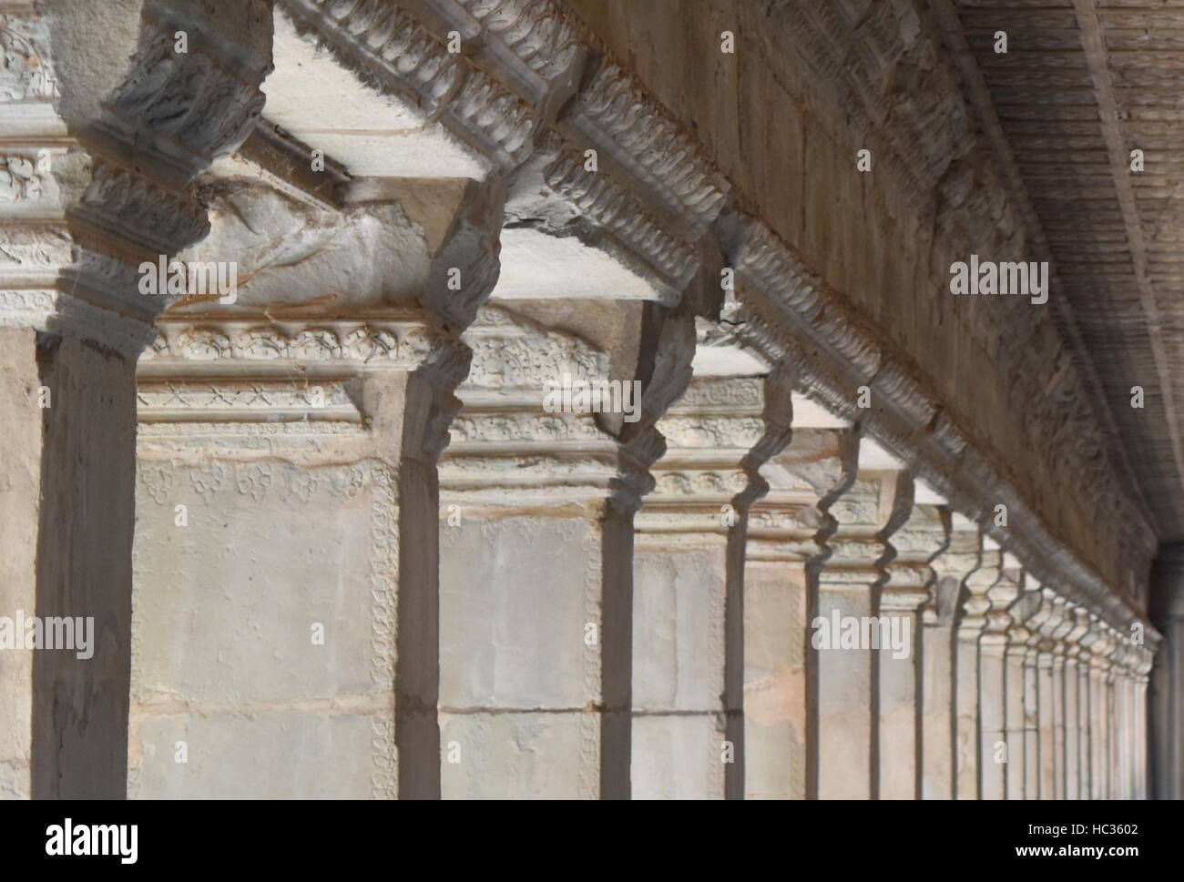 Recursive columns support ancient stone Buddhist temple ceiling of ...