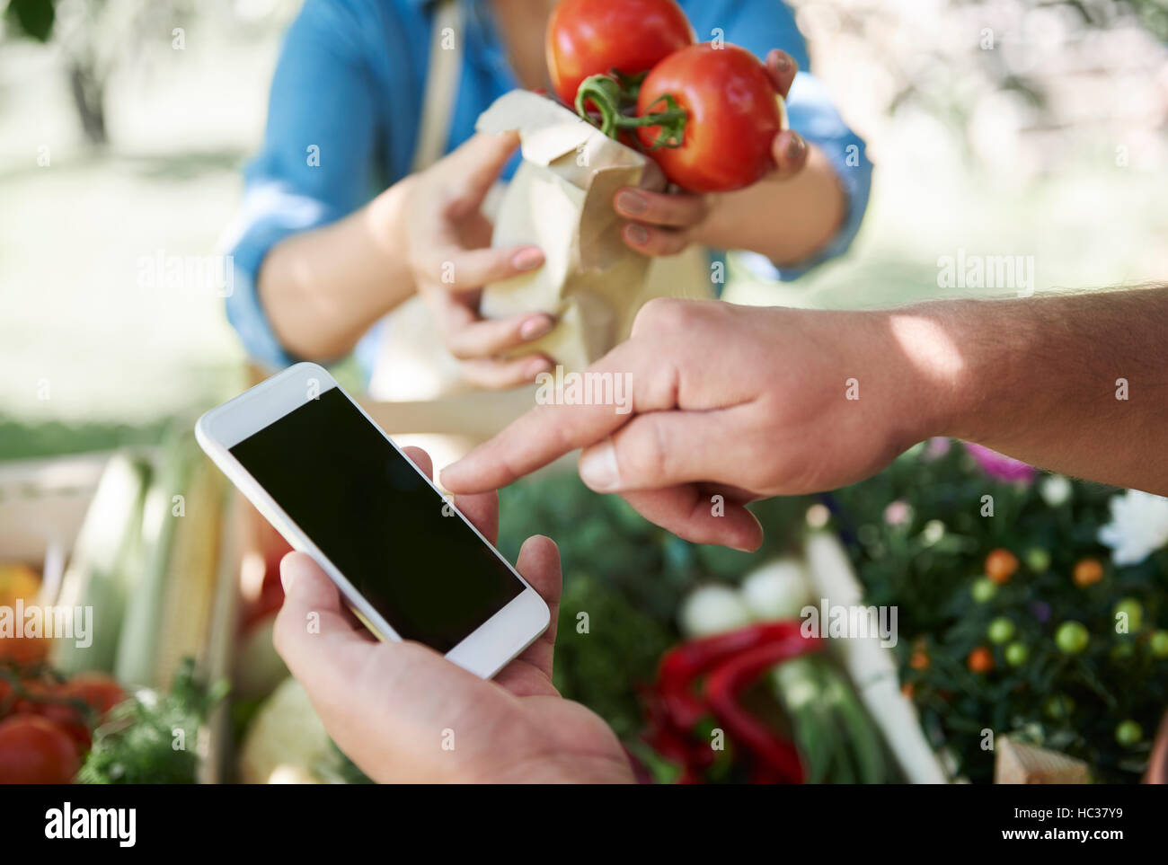 Using wireless technology to pay for food Stock Photo - Alamy