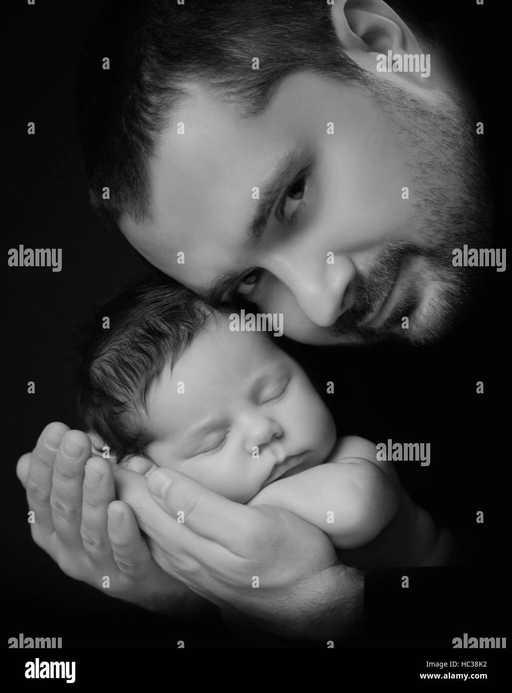 Girl on her father feet Black and White Stock Photos & Images - Alamy