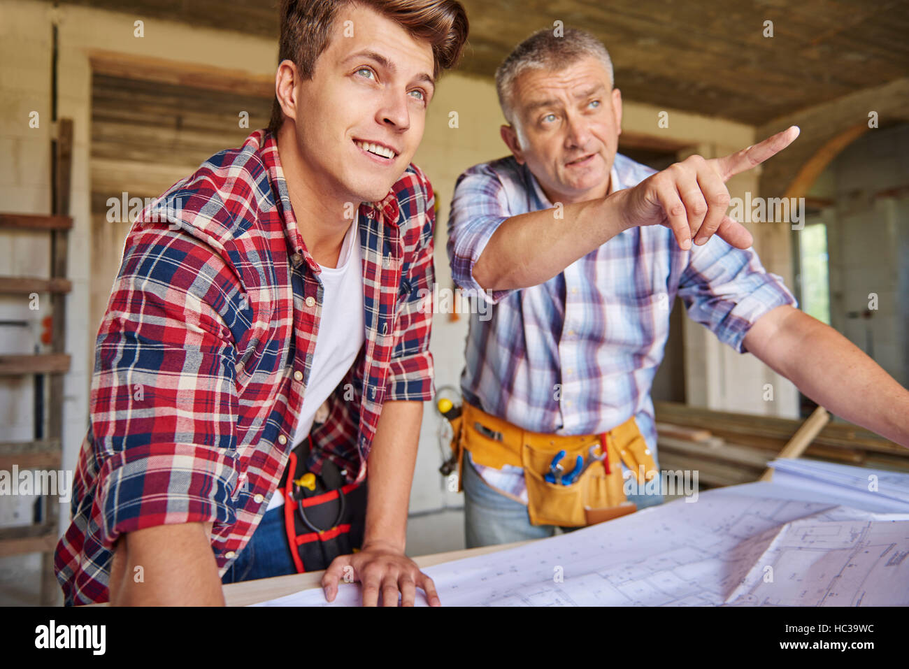 Young carpenter got some more guides Stock Photo - Alamy
