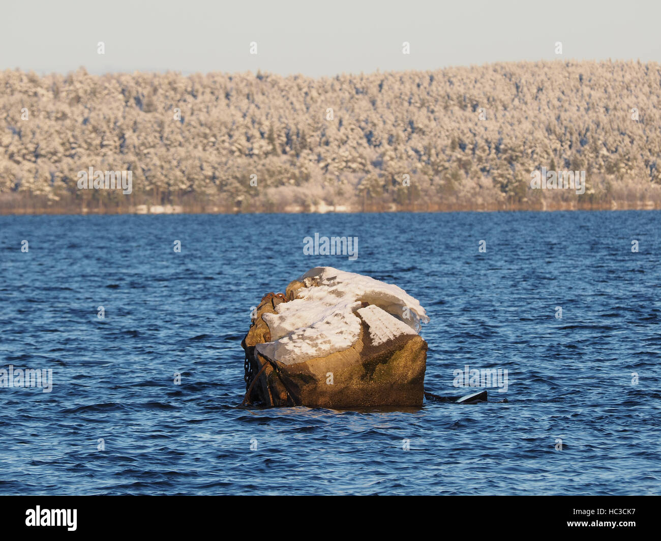 the frozen stone in the lake Stock Photo - Alamy