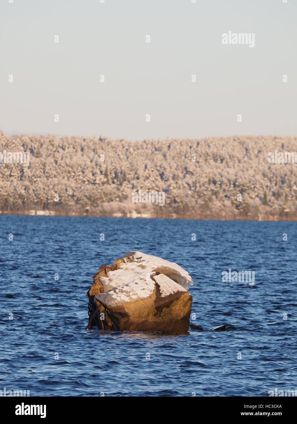 the frozen stone in the lake Stock Photo - Alamy