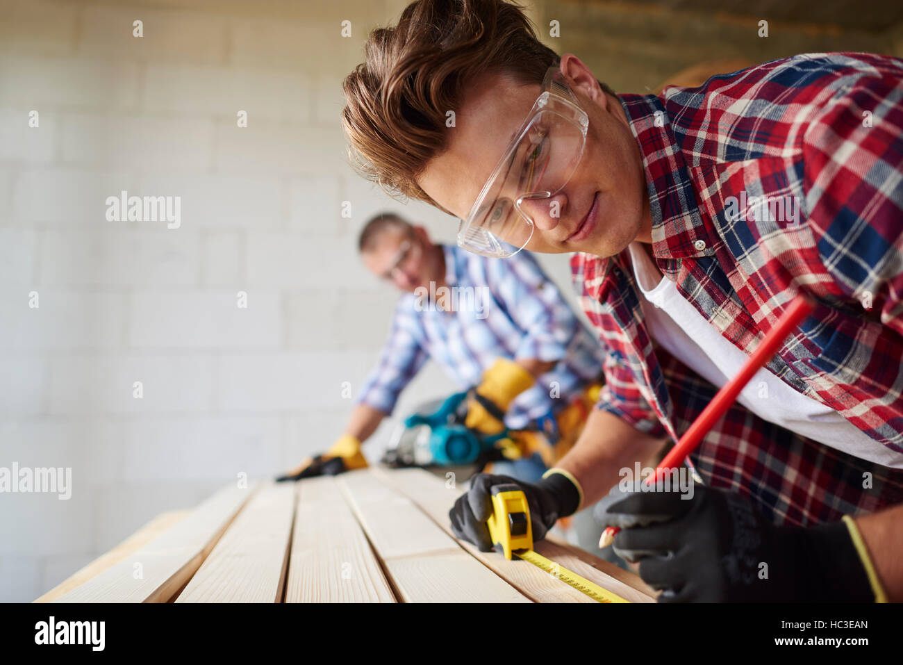 Two men hand something hi-res stock photography and images - Alamy