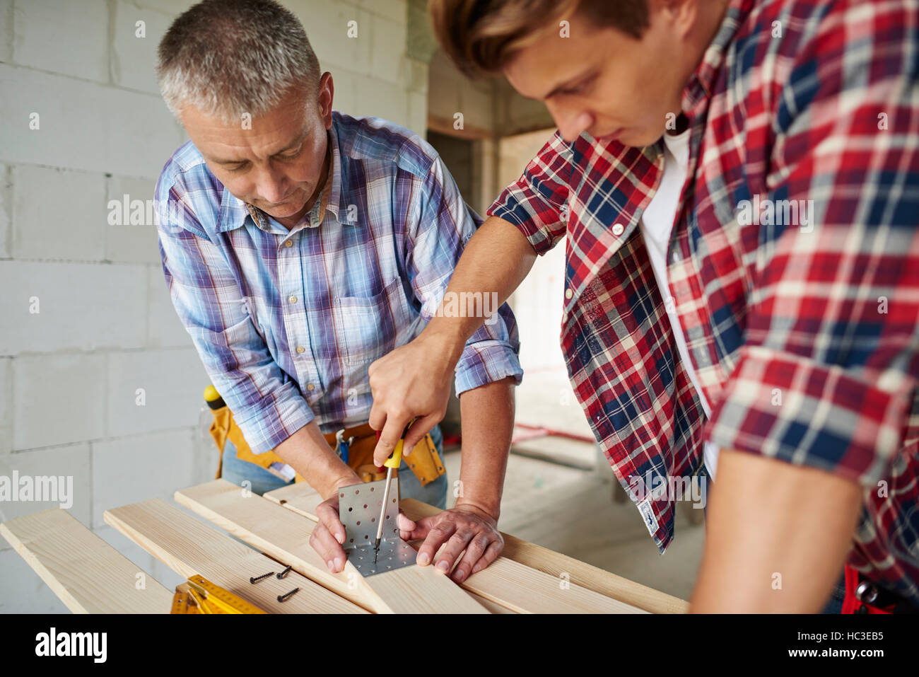 Work will be better using screwdriver Stock Photo - Alamy