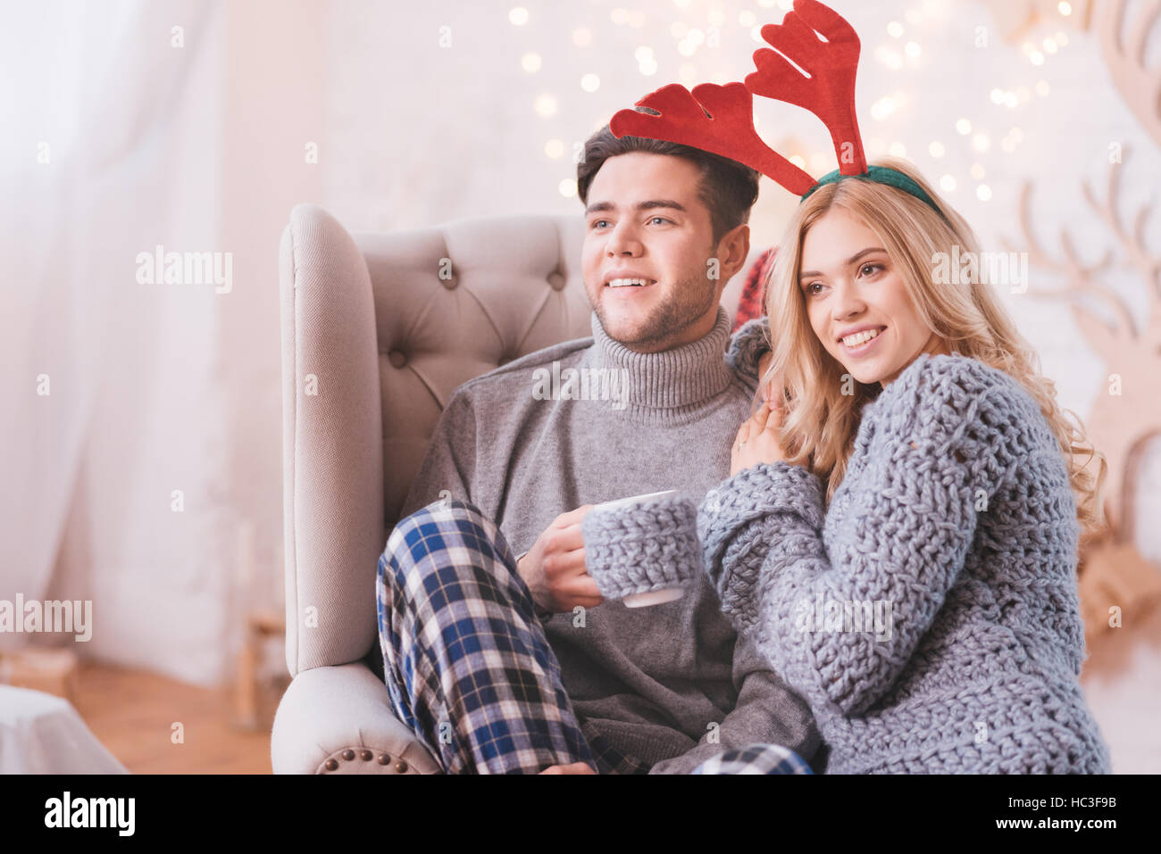 Delighted nice couple having fun together Stock Photo - Alamy