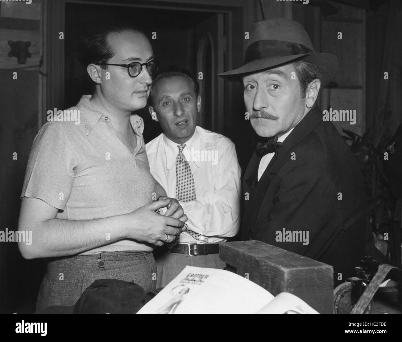ONE HUNDRED MEN AND A GIRL, from left: director Henry Koster, producer ...