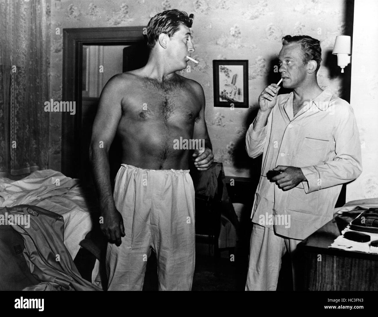 ONE MINUTE TO ZERO, Robert Mitchum, William Talman, 1952 Stock Photo ...