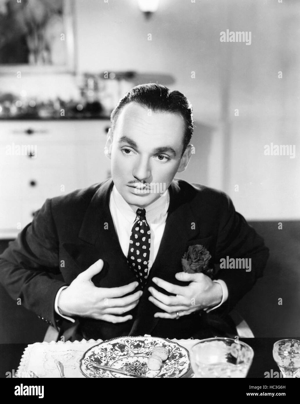 ONE RAINY AFTERNOON, Erik Rhodes, 1936 Stock Photo - Alamy