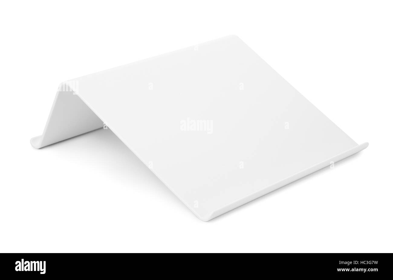 White plastic tablet stand isolated on white Stock Photo - Alamy