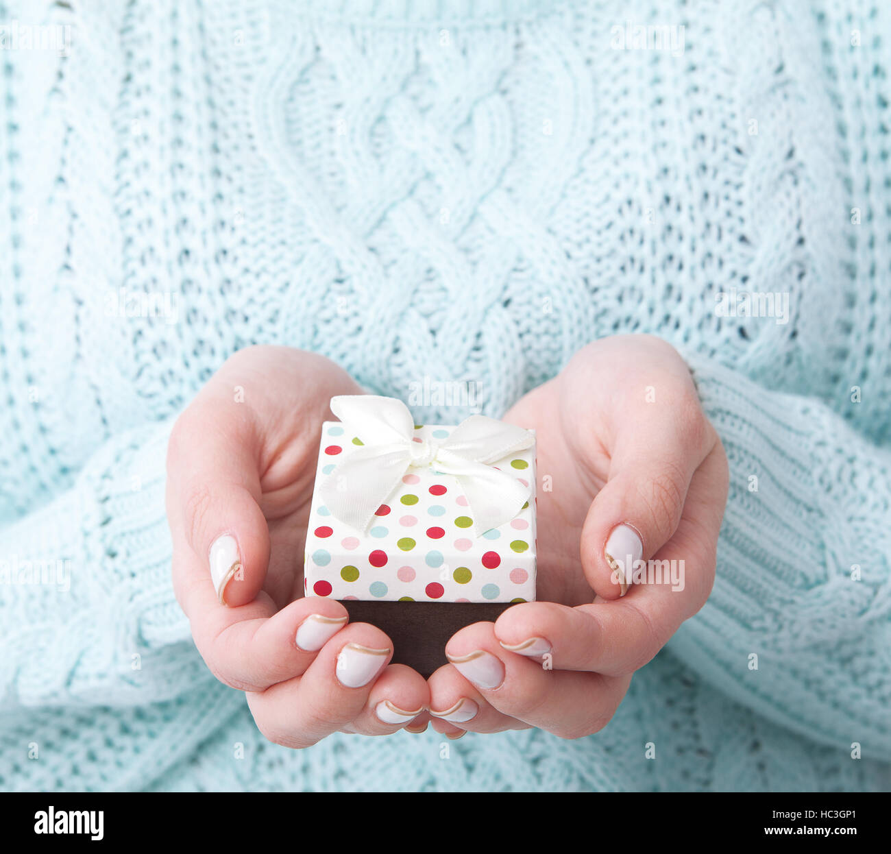 Present. Gift bos. Woman holding small gift box with ribbon Stock Photo ...