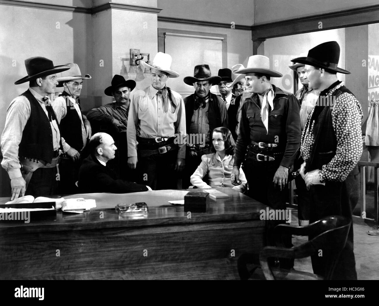 OVERLAND STAGE RAIDERS, John Wayne, (center, white hat), Louise Brooks ...