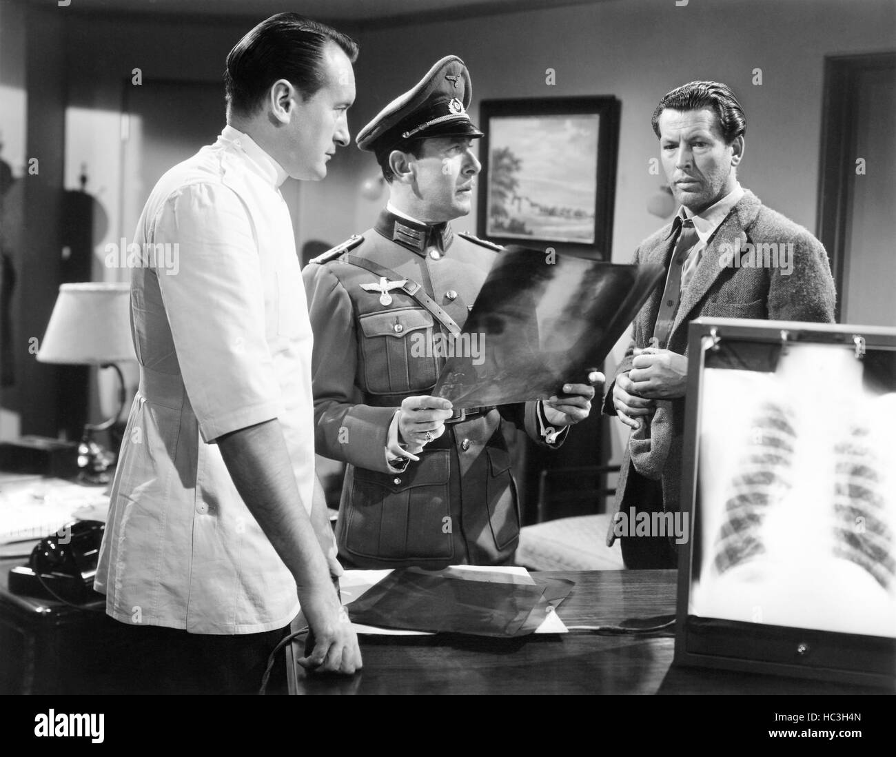PARIS AFTER DARK, from left: George Sanders, John Wengraf, Philip Dorn ...