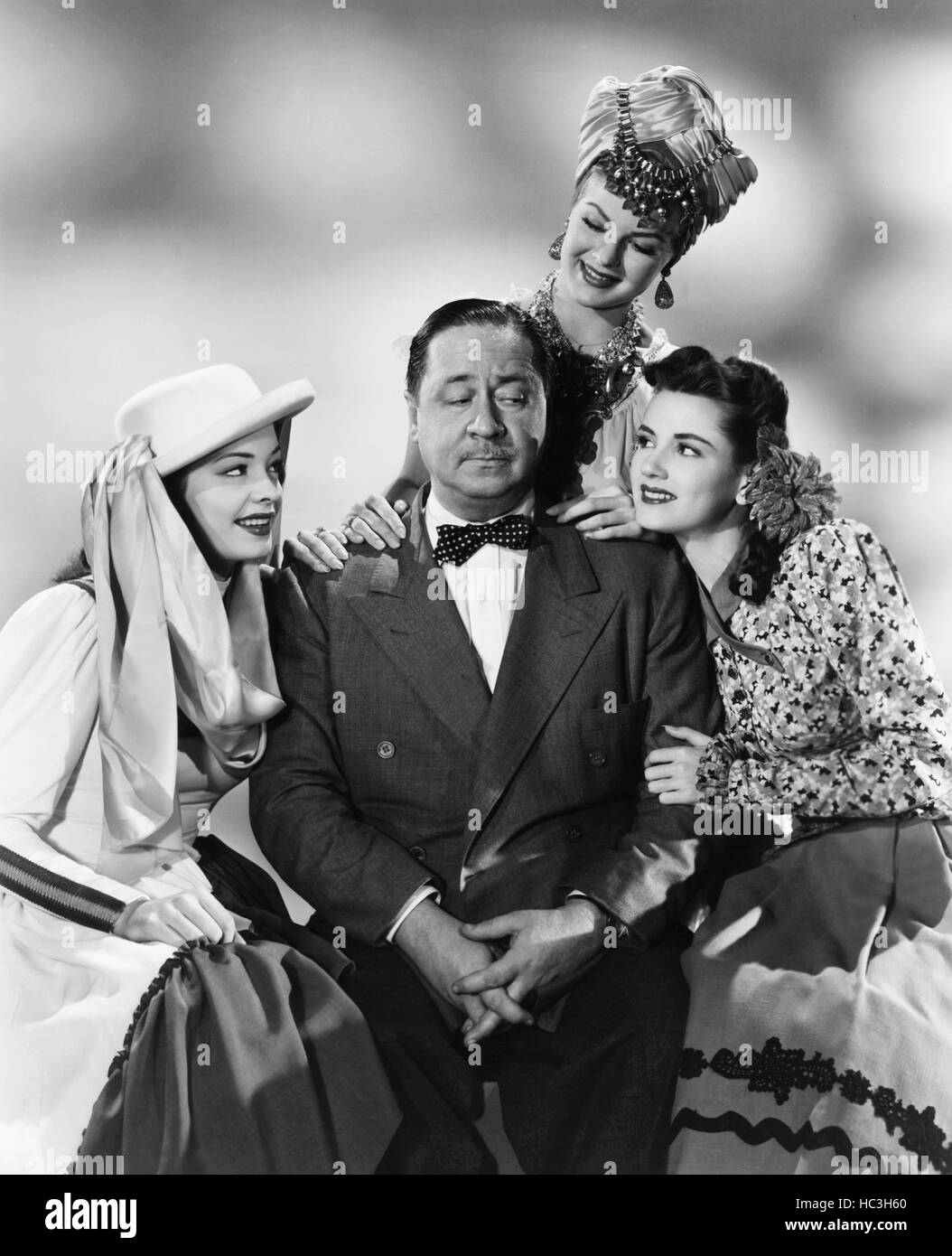 PAN-AMERICANA, Robert Benchley, being ogled by RKO starlets (from left ...