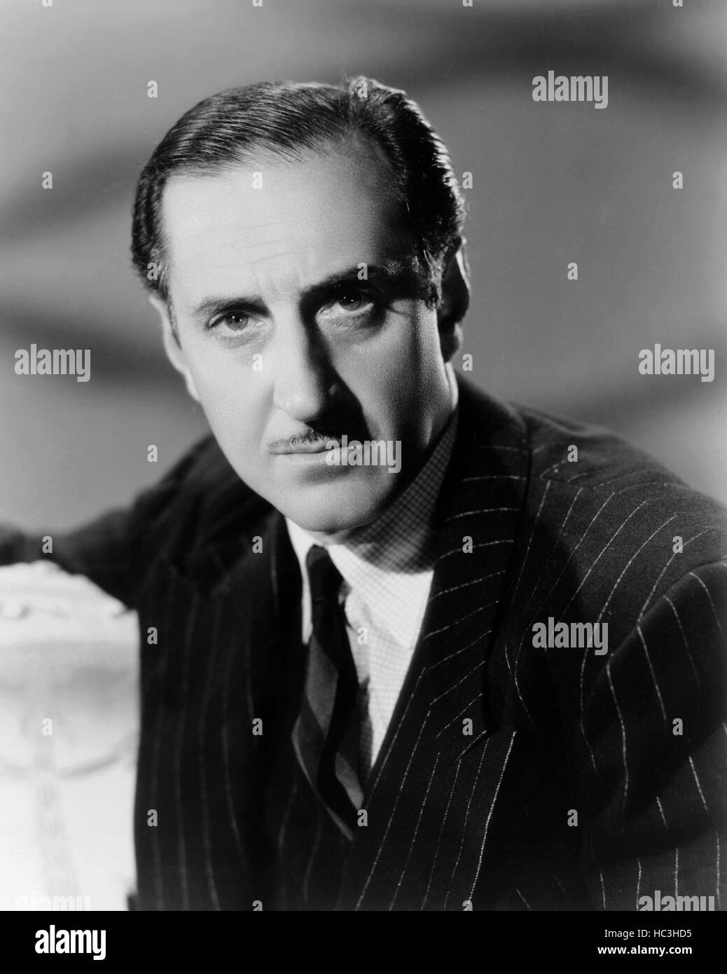 PARIS BOMBSHELL, (aka PARIS CALLING), Basil Rathbone, 1941 Stock Photo ...