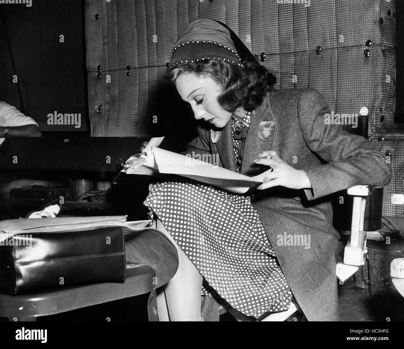 PARIS CALLING, Elisabeth Bergner reading her script on set, 1941 Stock ...