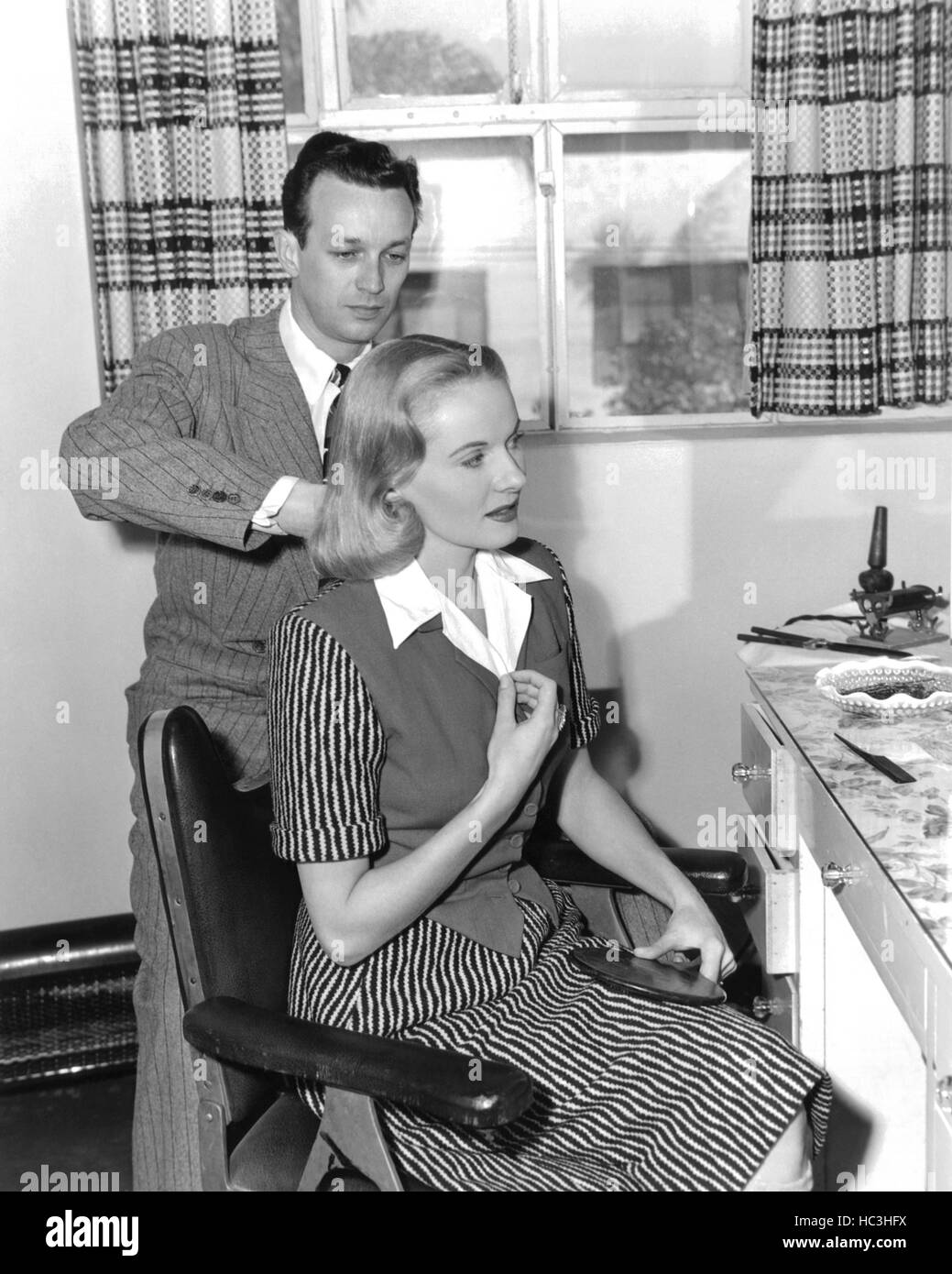 THE PARADINE CASE, Ann Todd, having her hair done by Larry Germaine ...
