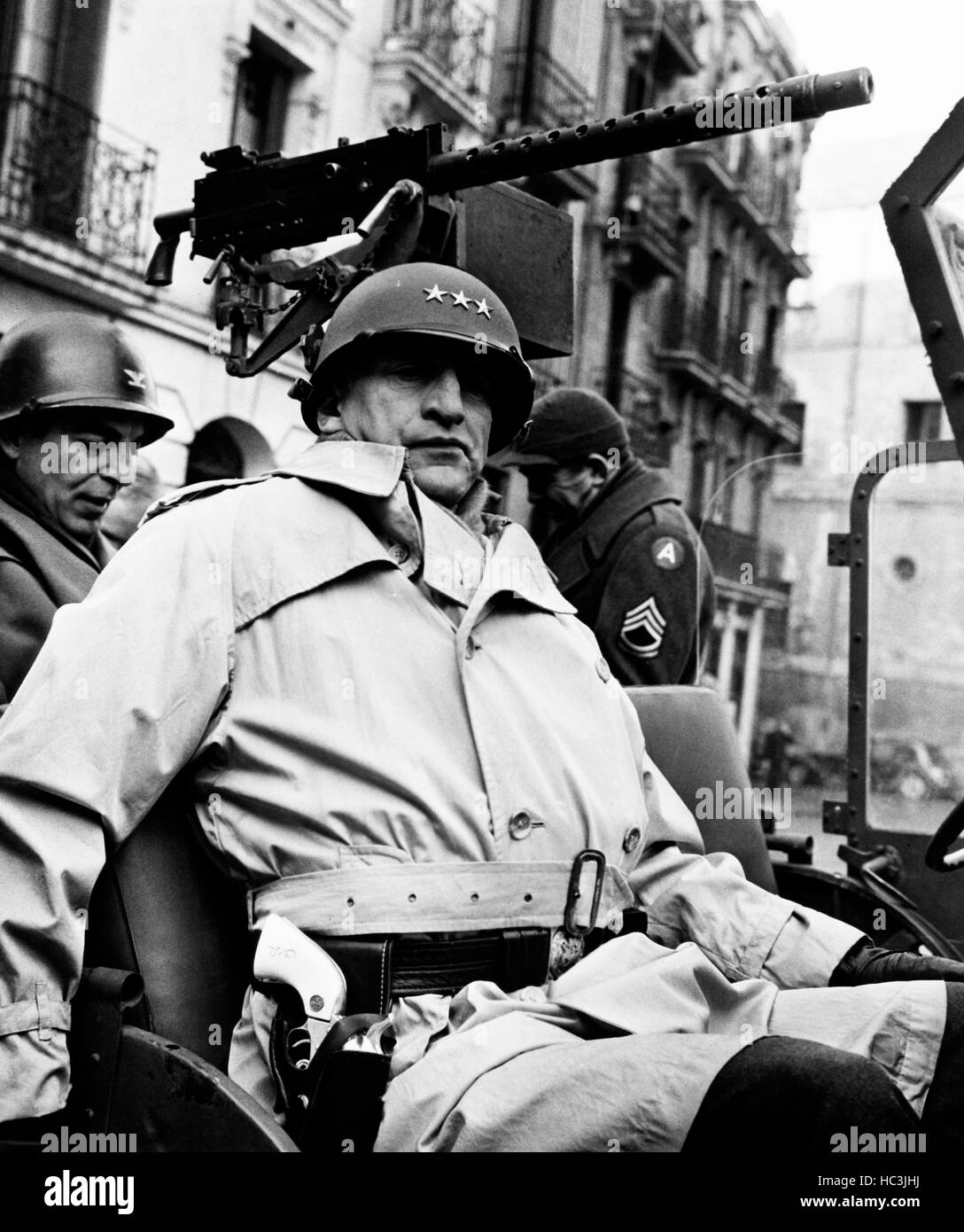 PATTON, George C. Scott as general George Patton, Paul Stevens (rear ...