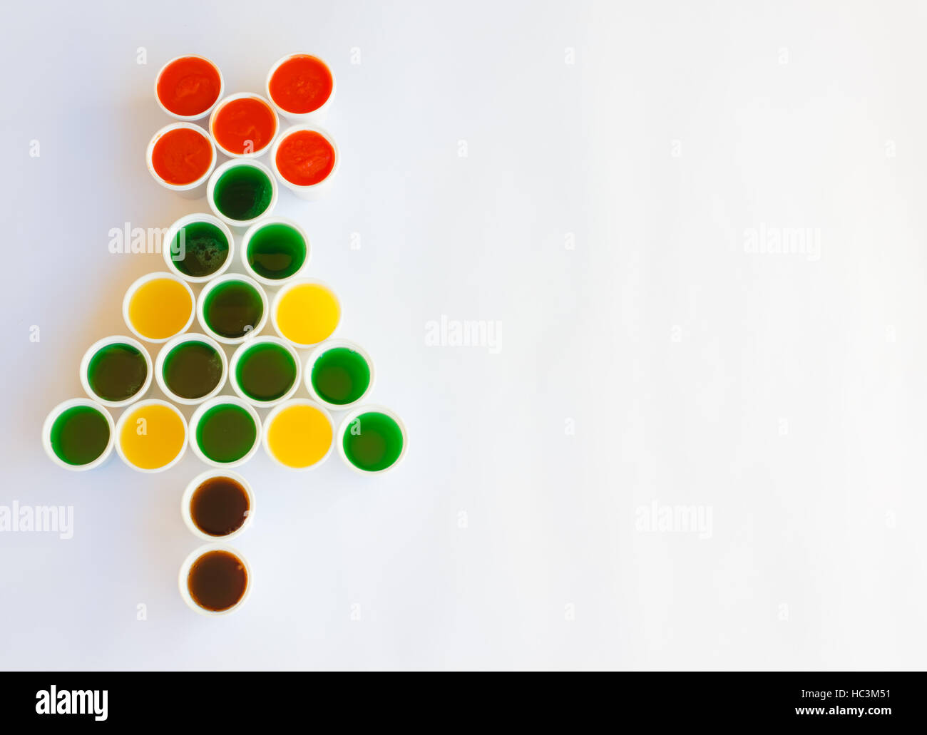 a christmas tree made of coloured glasses Stock Photo - Alamy