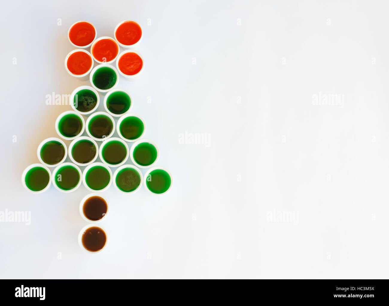 a christmas tree made of coloured glasses Stock Photo - Alamy