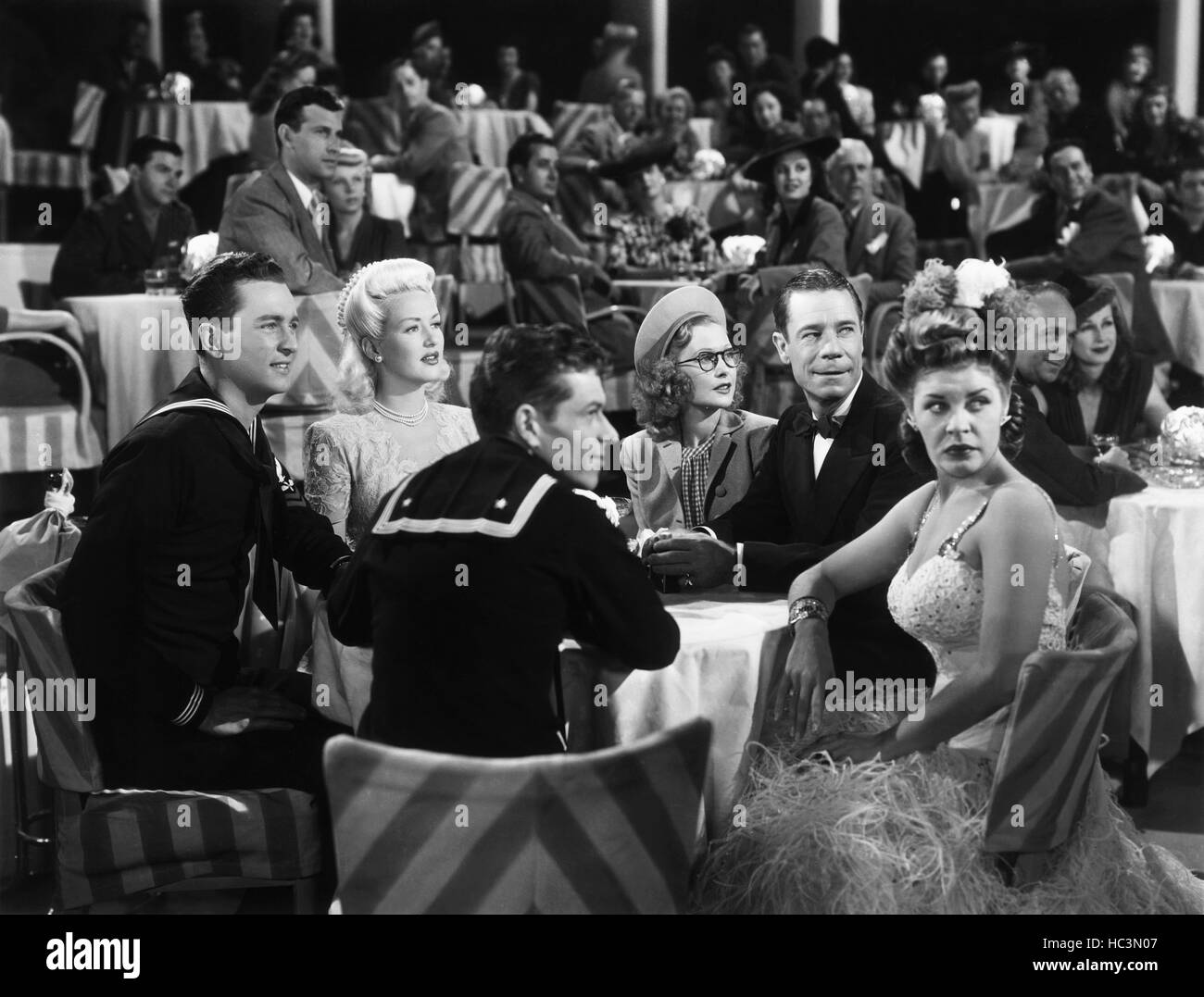 PIN UP GIRL, from left, John Harvey, Betty Grable, Dave Willock ...